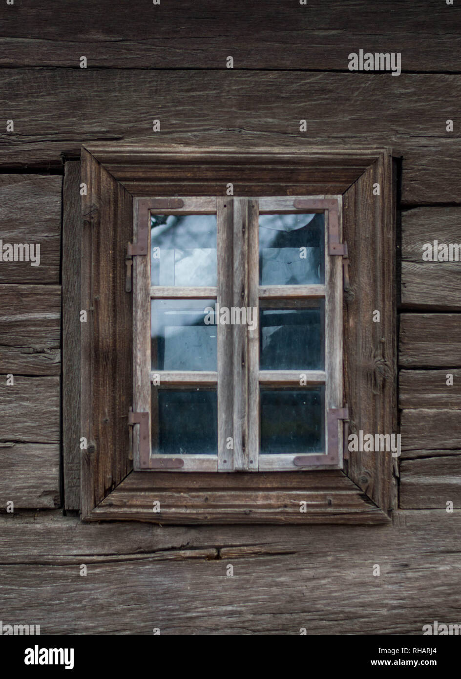 Traditional wooden and stone house with a windows - peasant cabin Stock ...