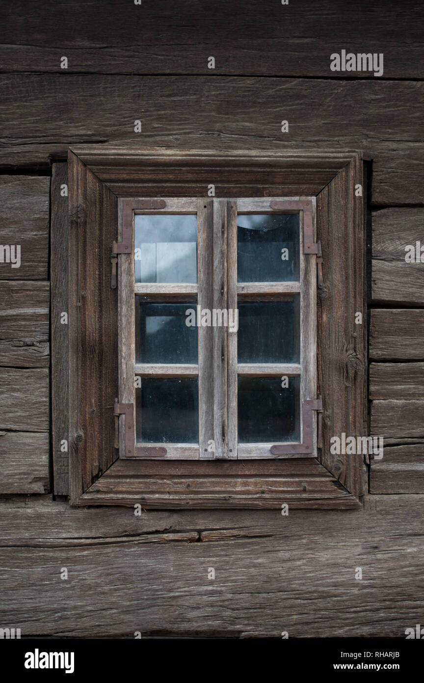 Traditional wooden and stone house with a windows - peasant cabin Stock ...