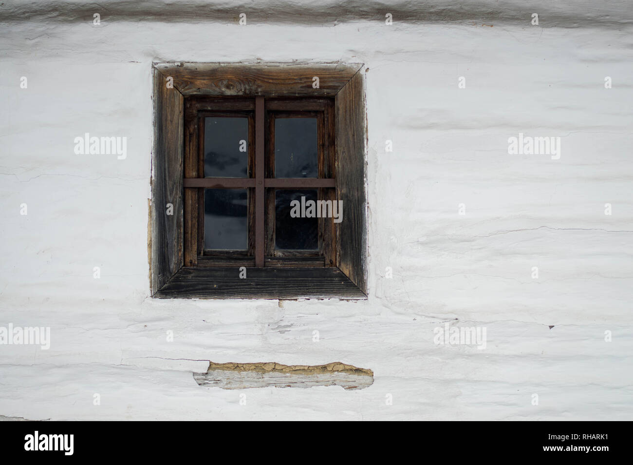 Traditional wooden and stone house with a windows - peasant cabin Stock ...