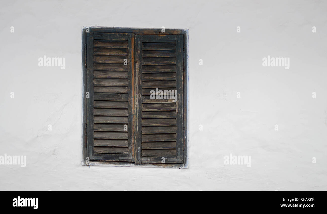 Traditional wooden and stone house with a windows - peasant cabin Stock ...