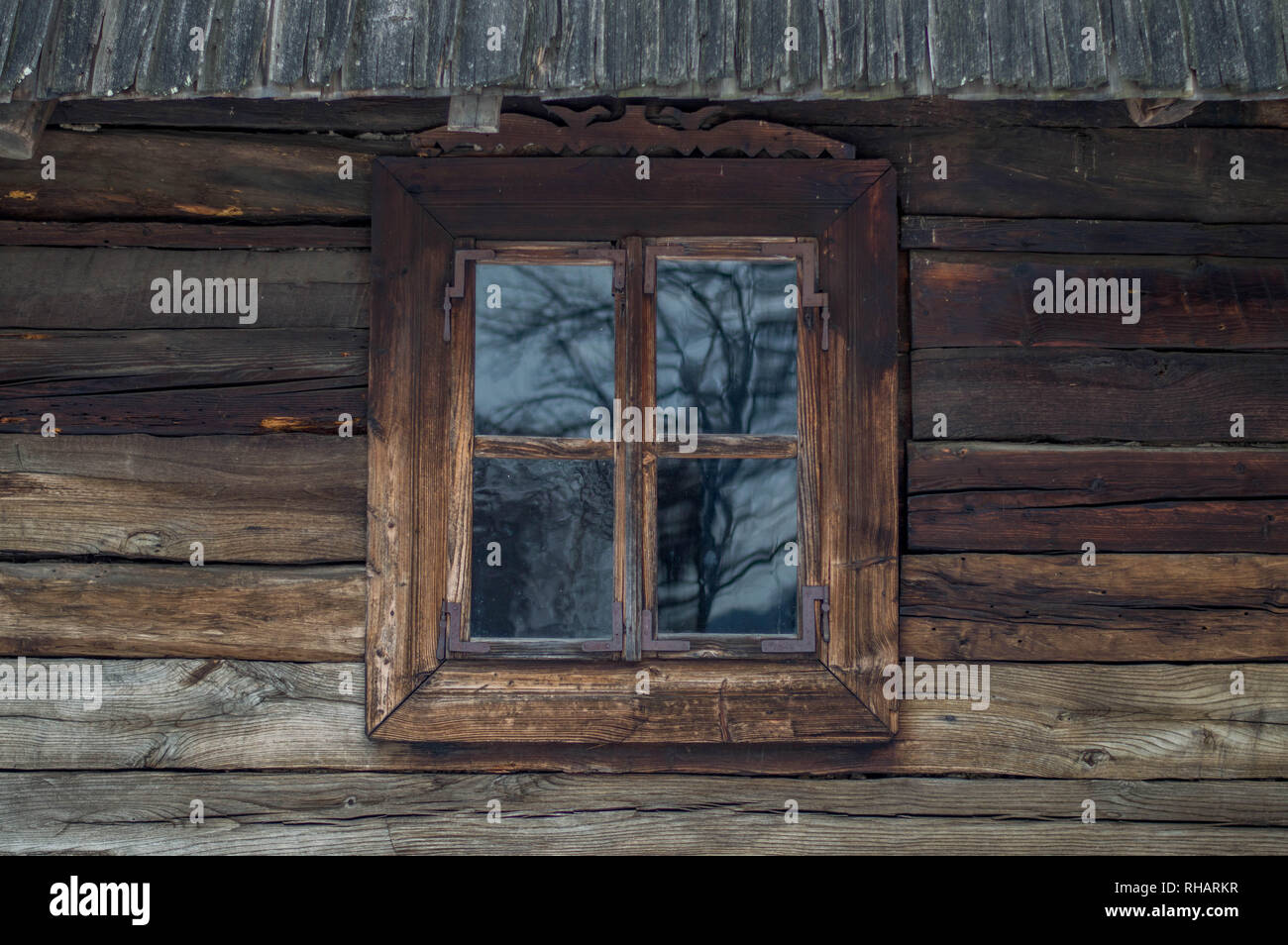 Traditional wooden and stone house with a windows - peasant cabin Stock ...