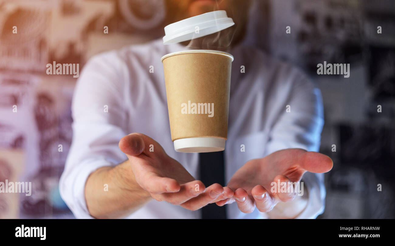 Barista in a white shirt with a tie holds floating in the air a paper ...