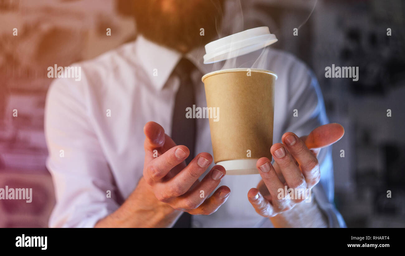 Barista in a white shirt with a tie holds floating in the air a paper ...