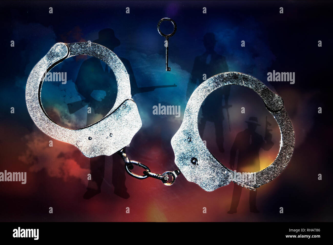 Vintage handcuffs on dark background Stock Photo - Alamy