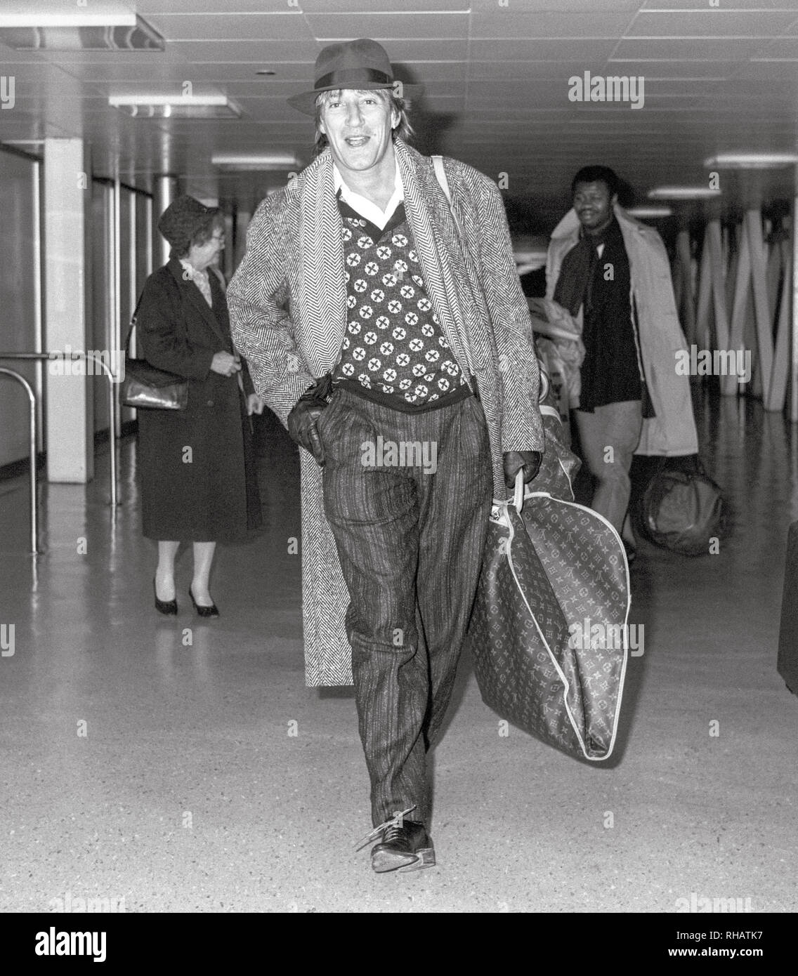 British Rock singer Rod Stewart arriving at Heathrow Airport in ...