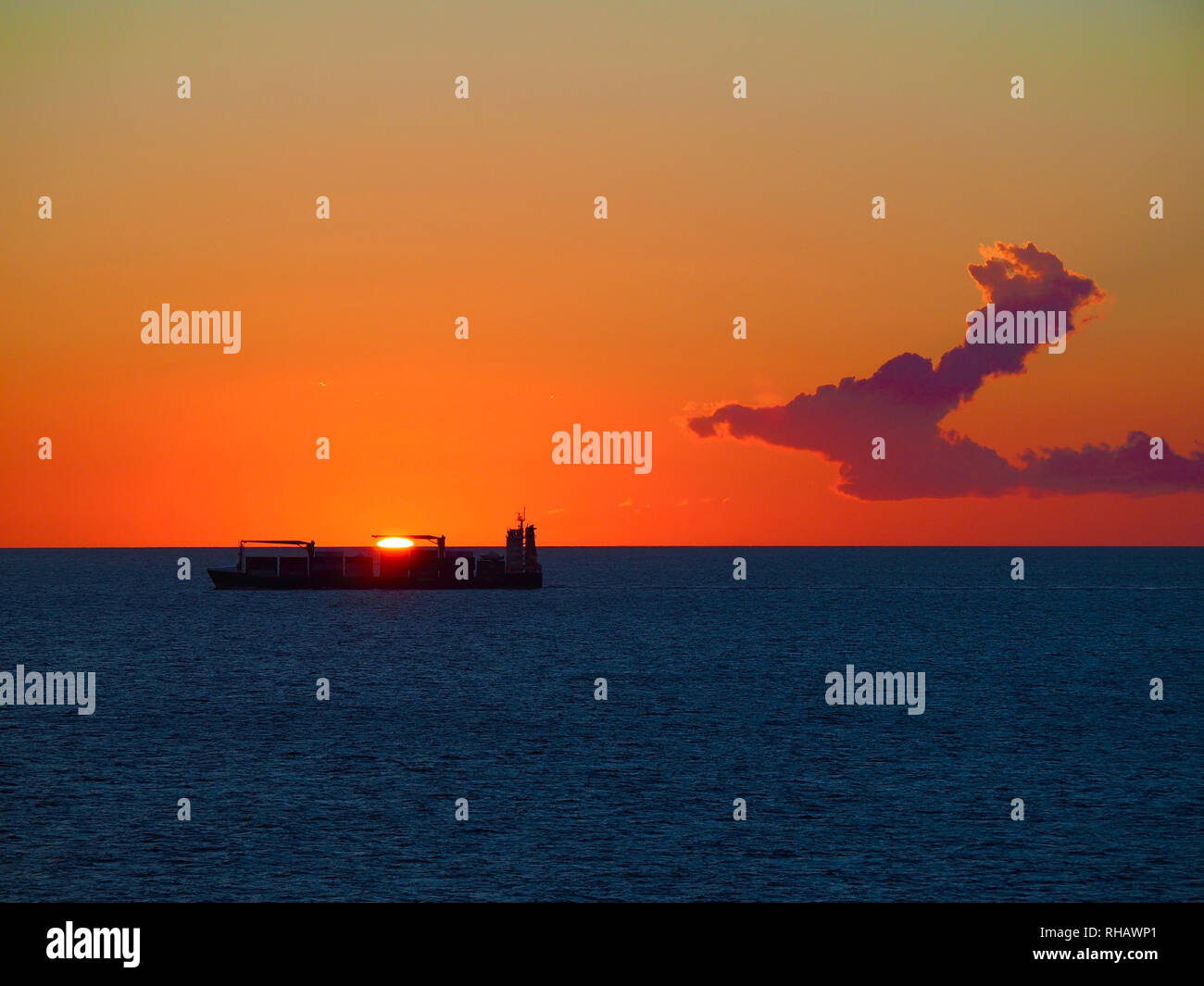 Watching sunset in the ocean while taking off from Haiti, Caribbeans ...