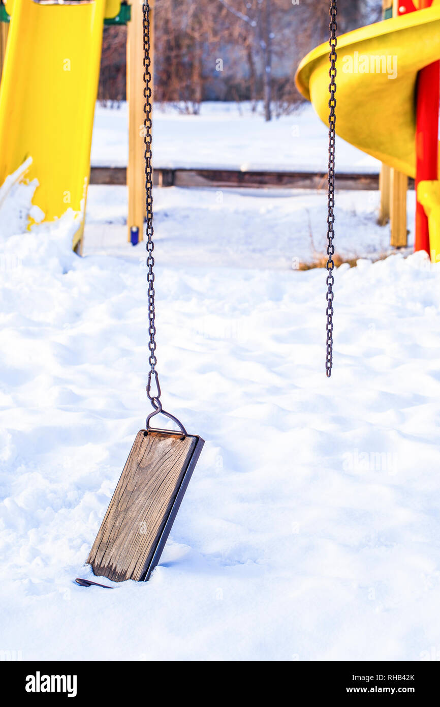 Broken swing and playground hi-res stock photography and images - Alamy
