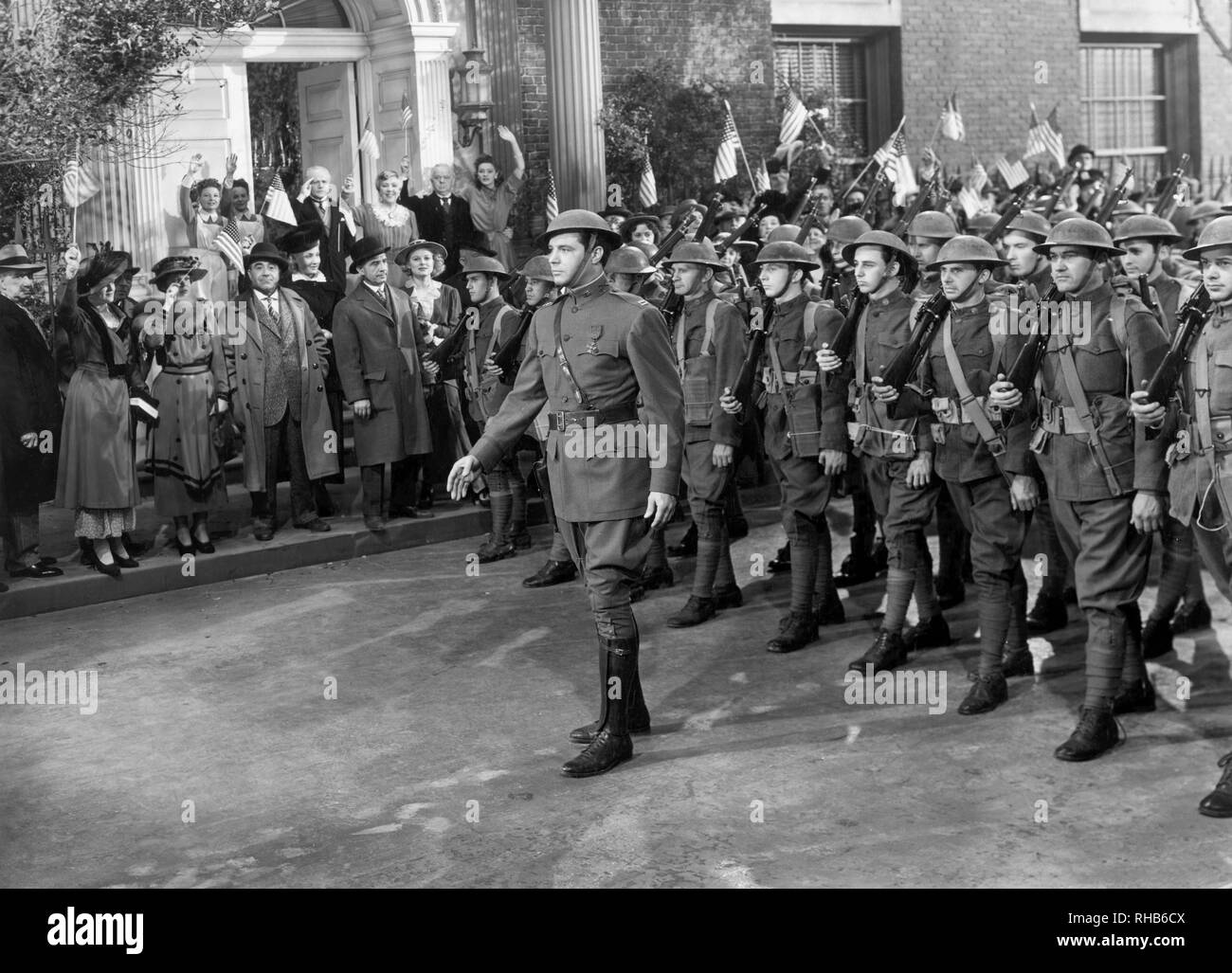 James Craig (center leading March), on-set of the Film, "Friendly Enemies", United Artists, 1942 ...