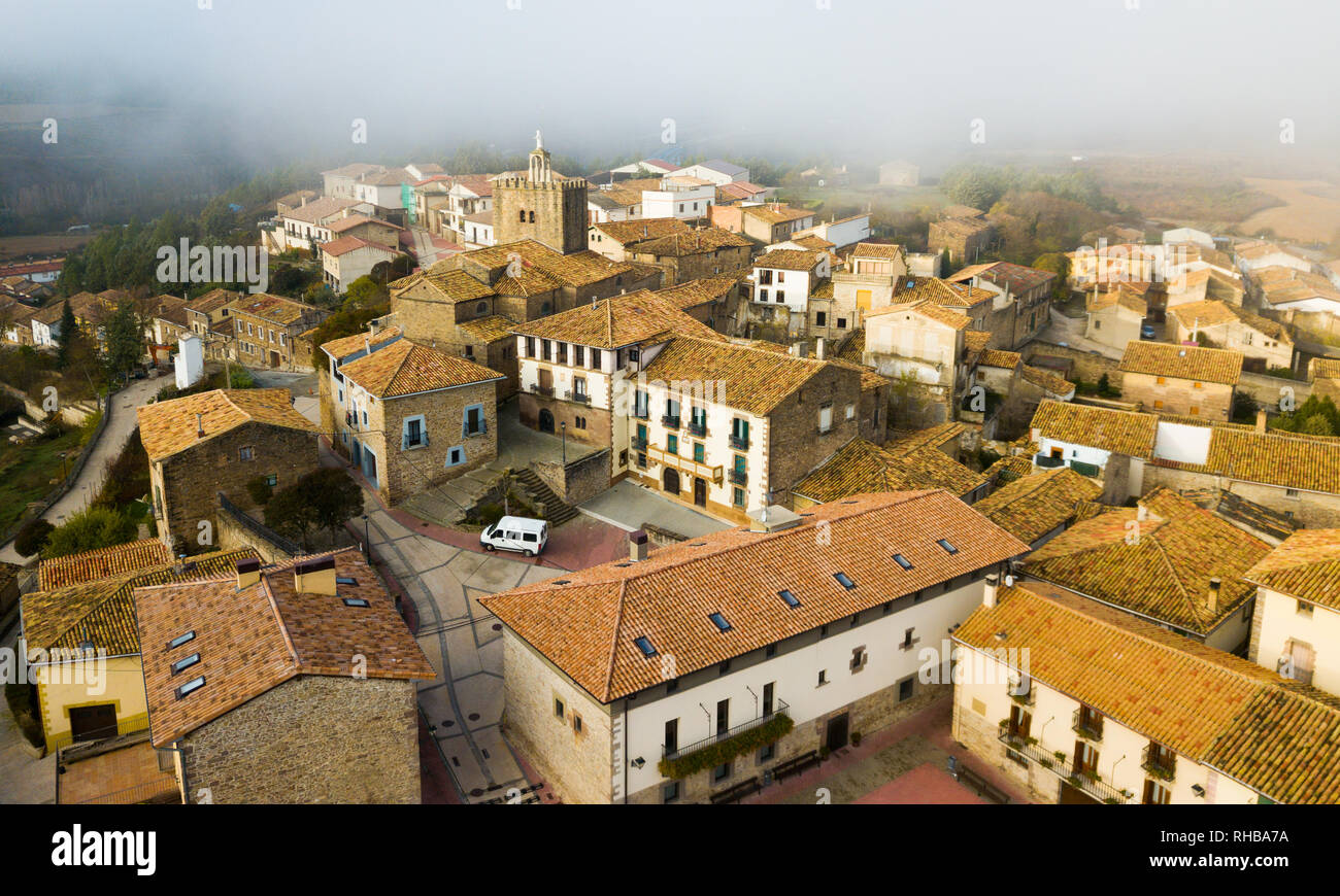 View from drone of roofs of houses in traditional village of Liedena in ...