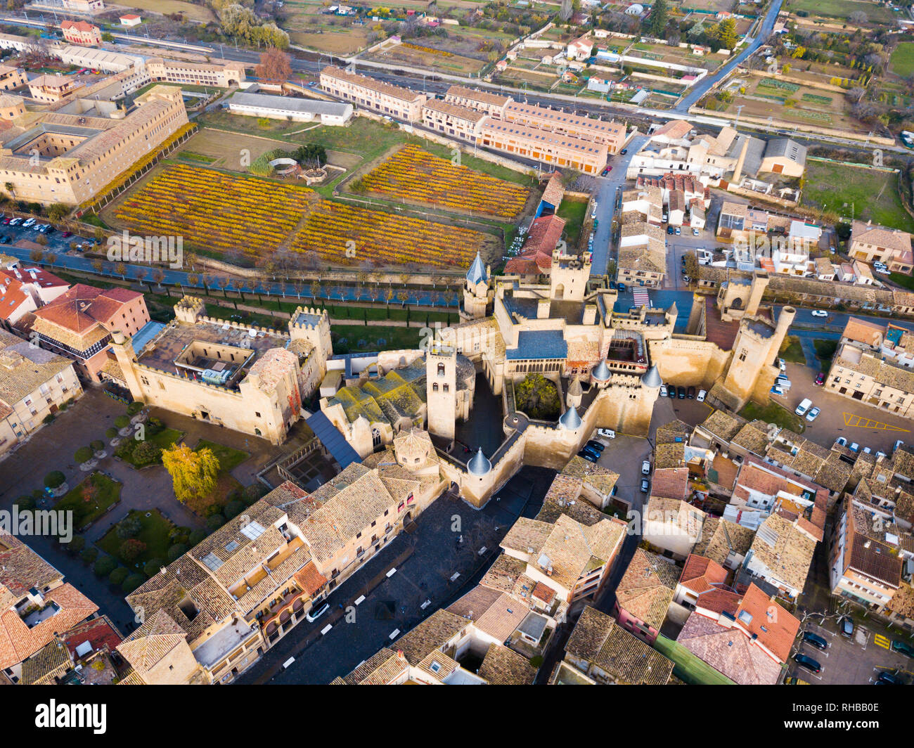 Aerial view of impressive medieval Royal Palace of Olite in autumn day ...
