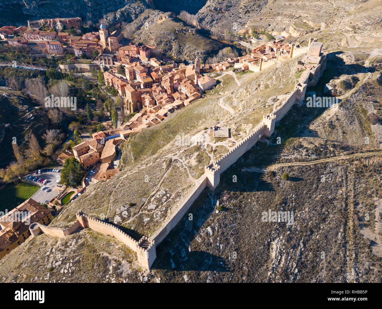 Aerial view of Albarracin - medieval town with fortress wall on ...