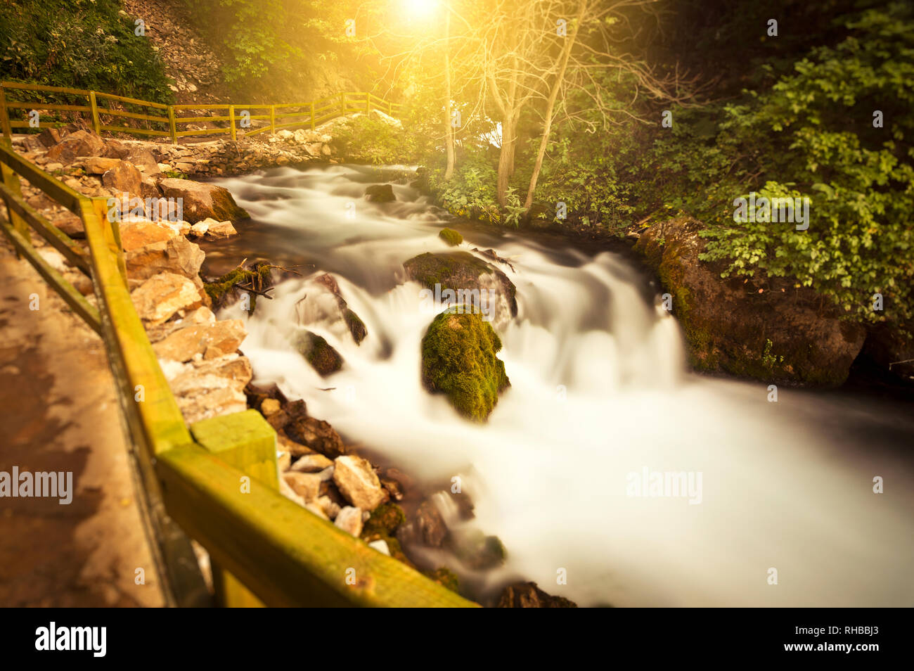 Stream with sun flare hi-res stock photography and images - Alamy