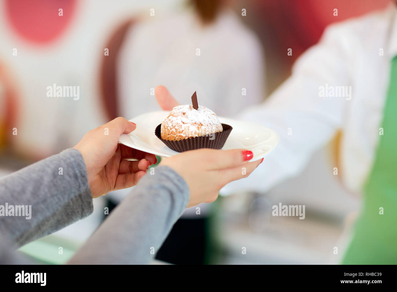 Hand taking sweets in sugar hi-res stock photography and images - Alamy