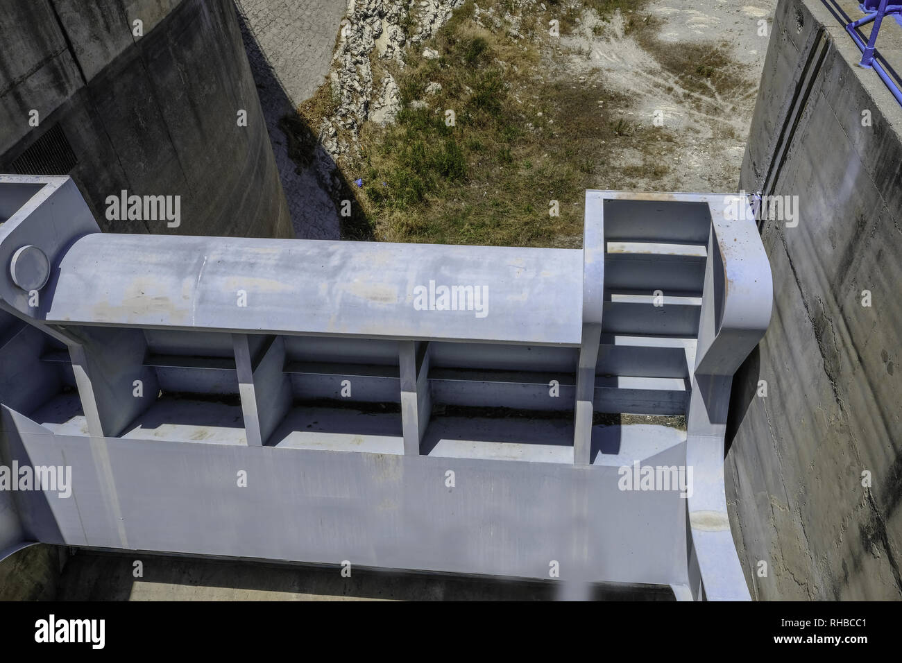 Closeup shot of the overflow, sluice gate mechanism beside the ...
