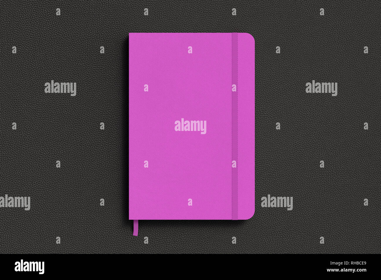 Magenta vertical notebook with elastic band on black background Stock ...