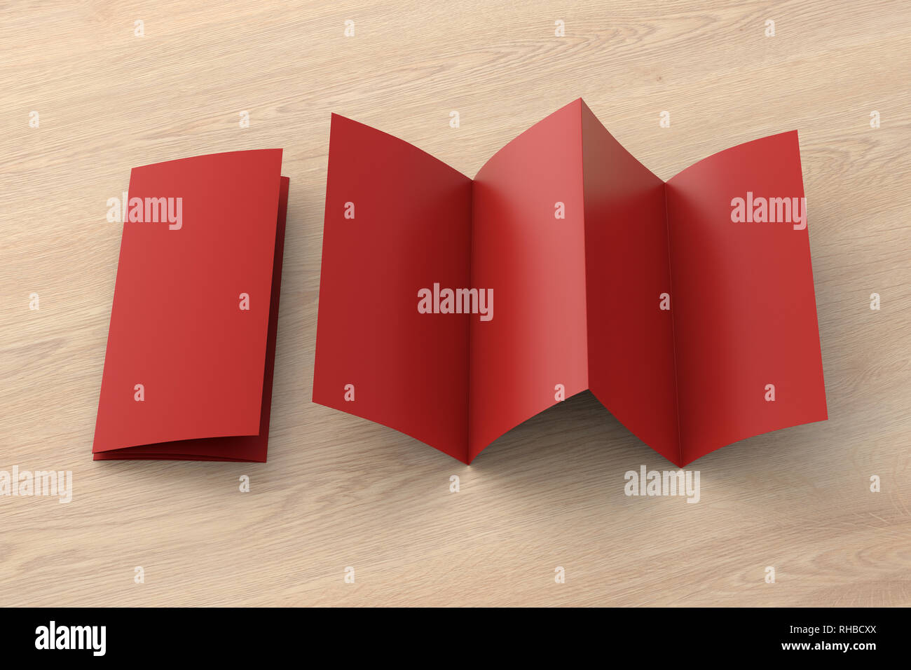 Blank red folded paper leaflet on wooden background. Eight pages, four ...