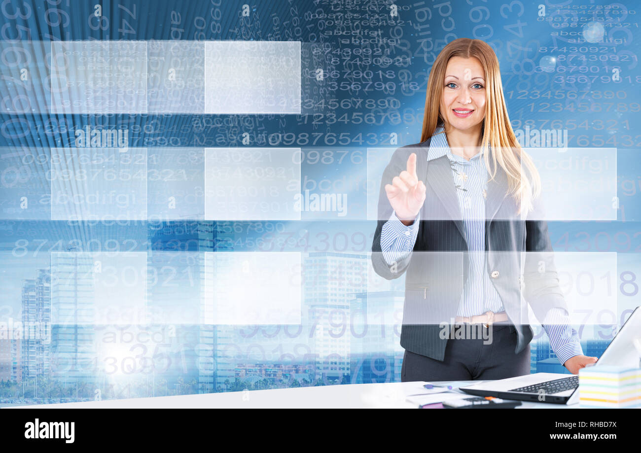 Female in suit testing digital monitor and touchscreen in the megapolis ...