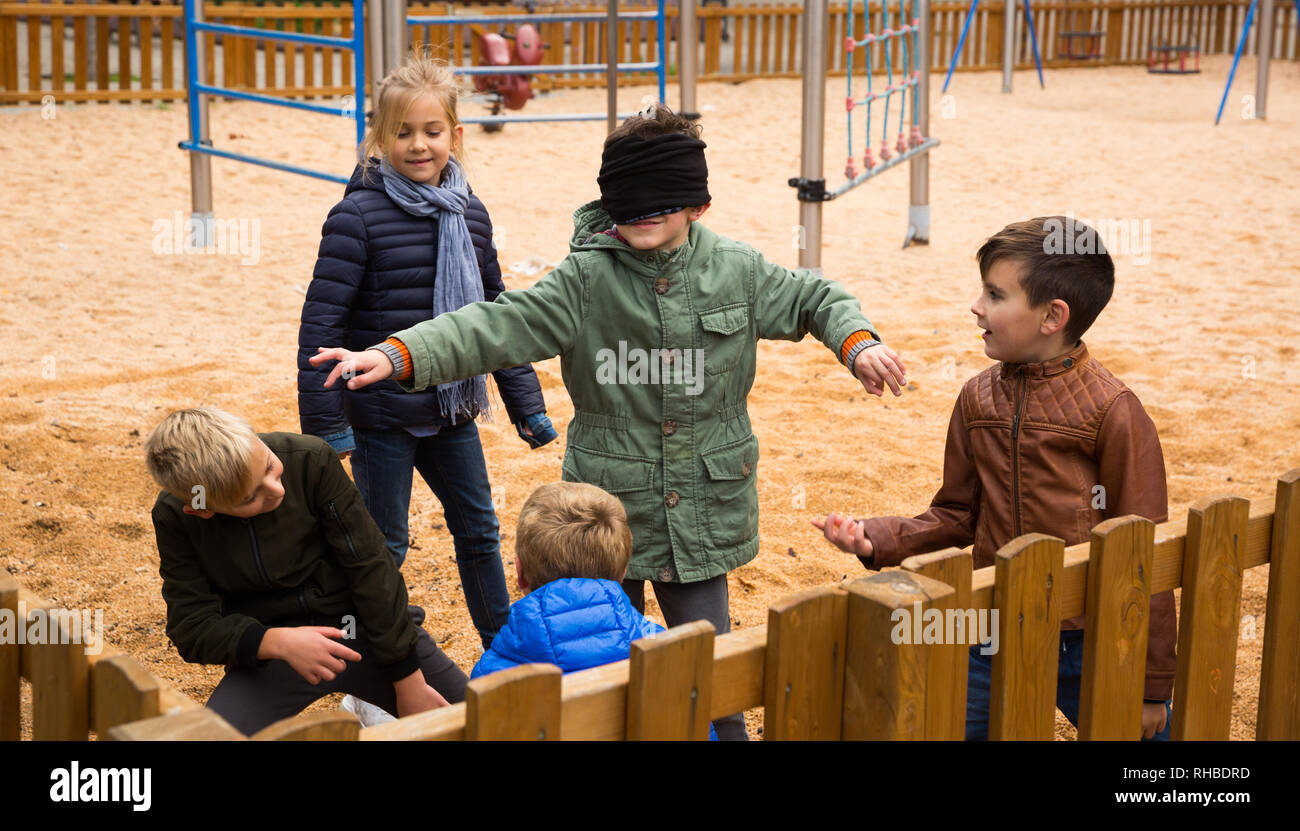 Children play in the blind man's buff Stock Photo - Alamy