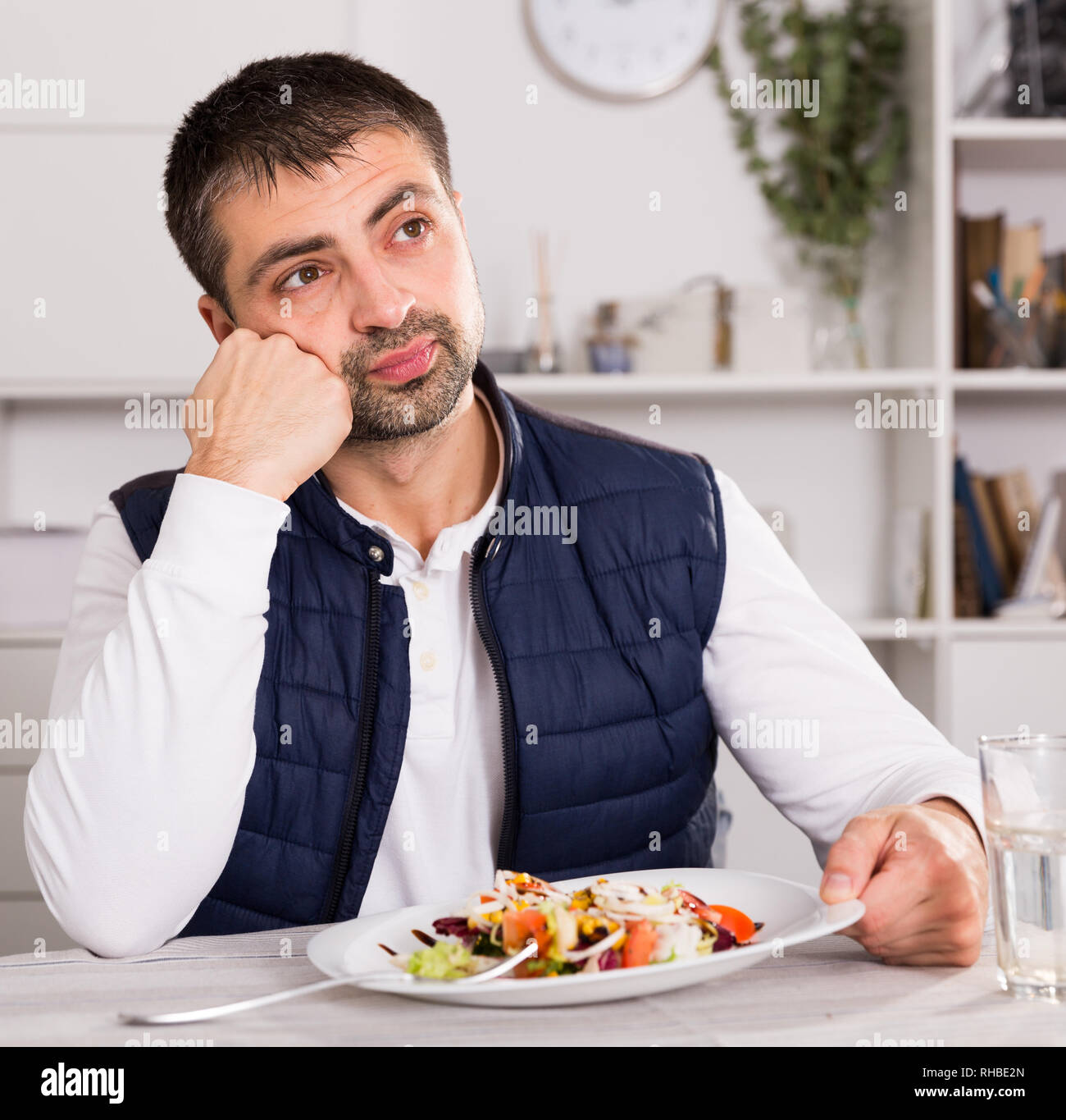 Man eating salad sad hi-res stock photography and images - Alamy