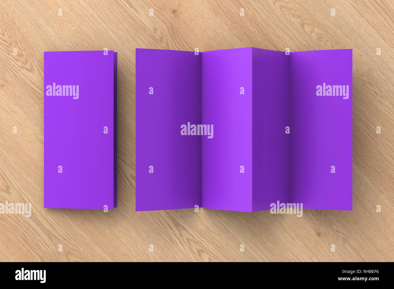 Blank violet folded paper leaflet on wooden background. Eight pages, four panel Stock Photo - Alamy