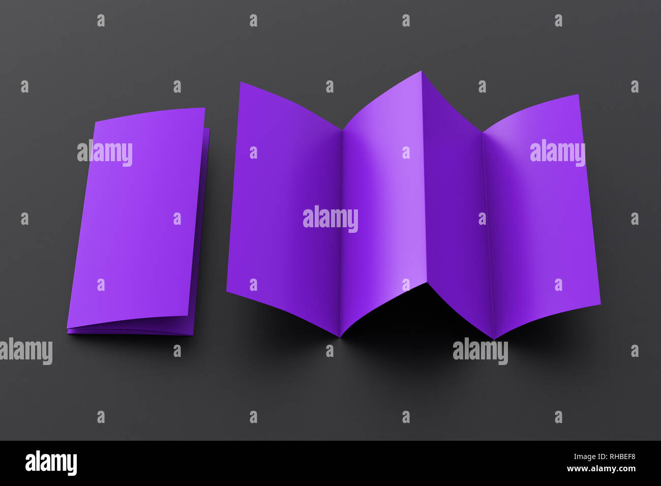 Blank violet folded paper leaflet on black background. Eight pages ...