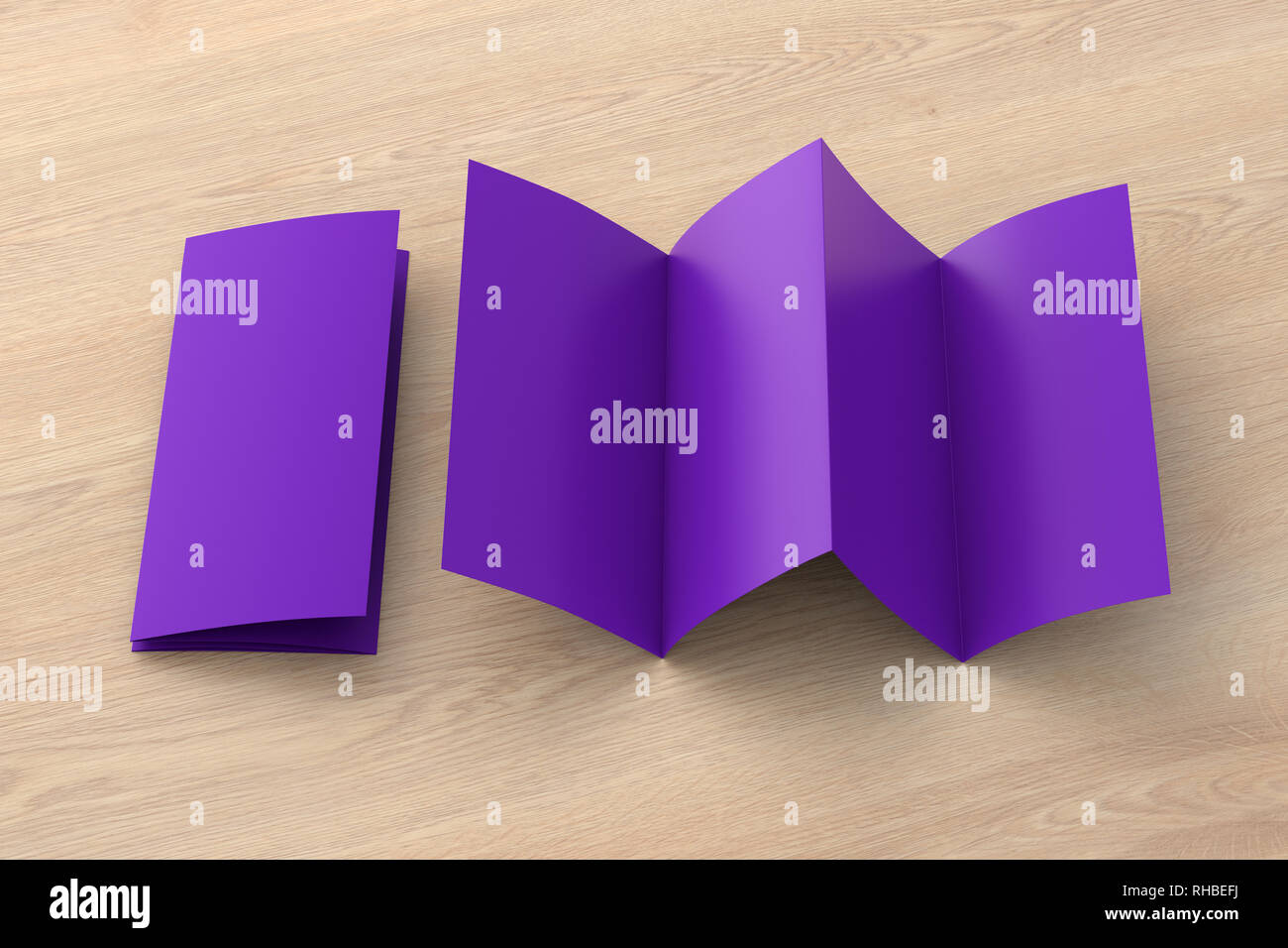 Blank violet folded paper leaflet on wooden background. Eight pages ...