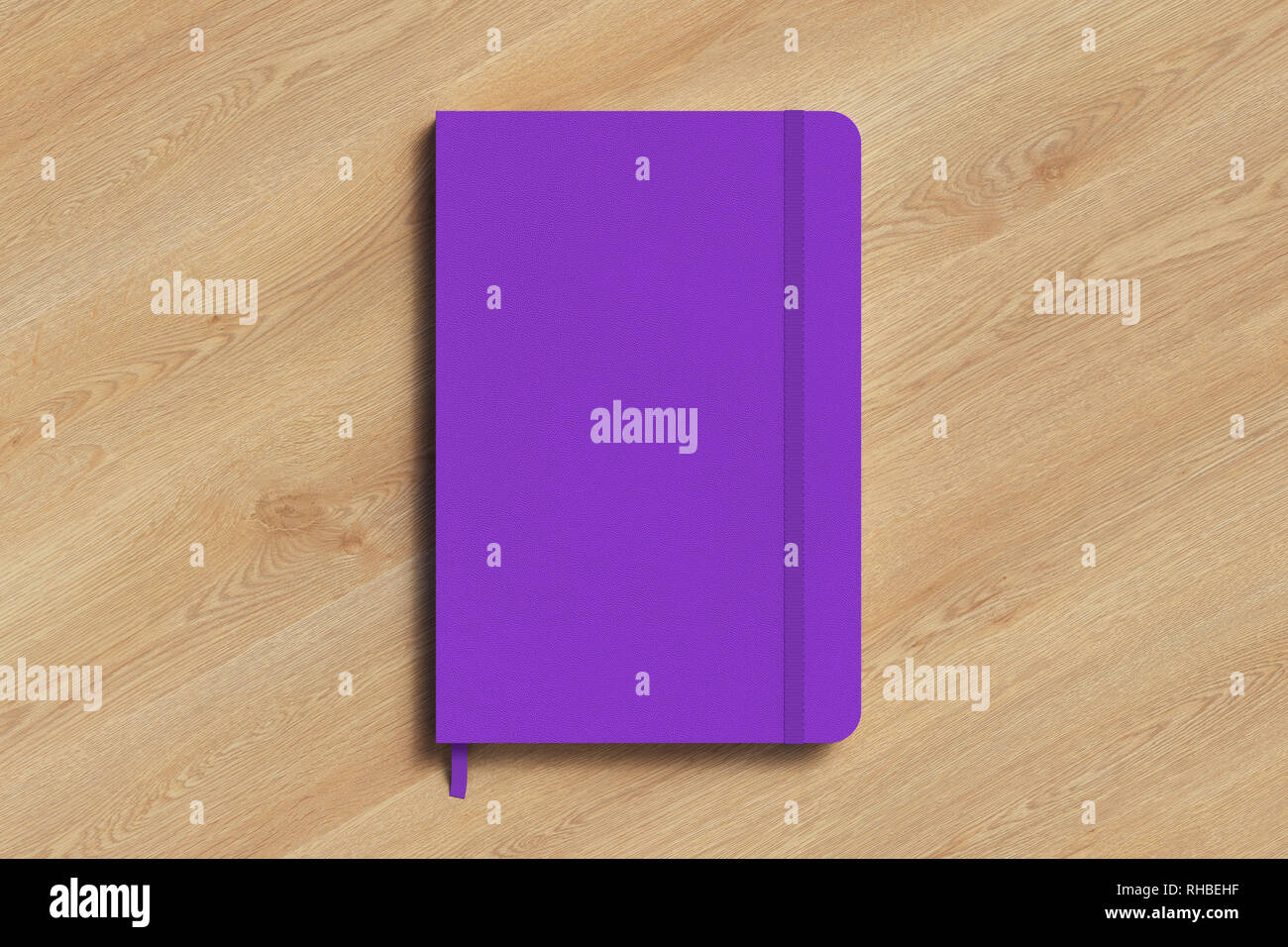 Violet vertical notebook with elastic band on wooden background Stock ...