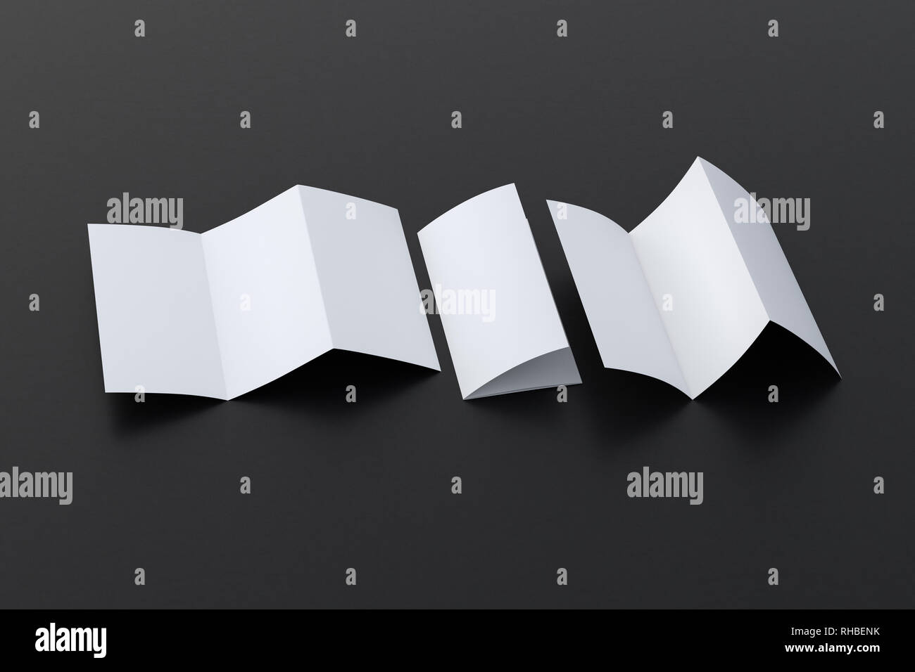 Blank trifold paper leaflet on black background. Six pages, three panel ...