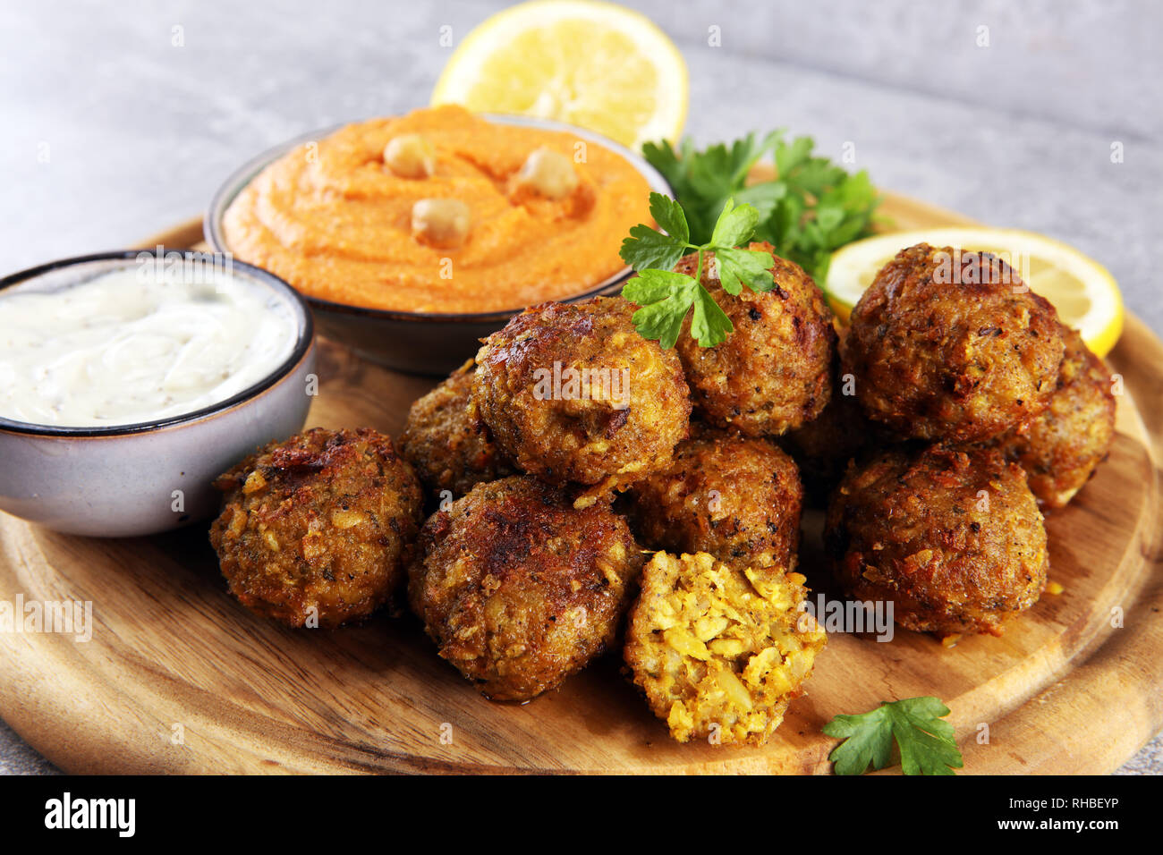 Traditional homemade hummus, falafel and chickpea served with spices on ...