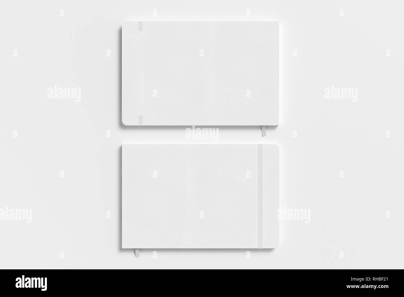 White horizontal notebook with elastic band on white background. Front ...