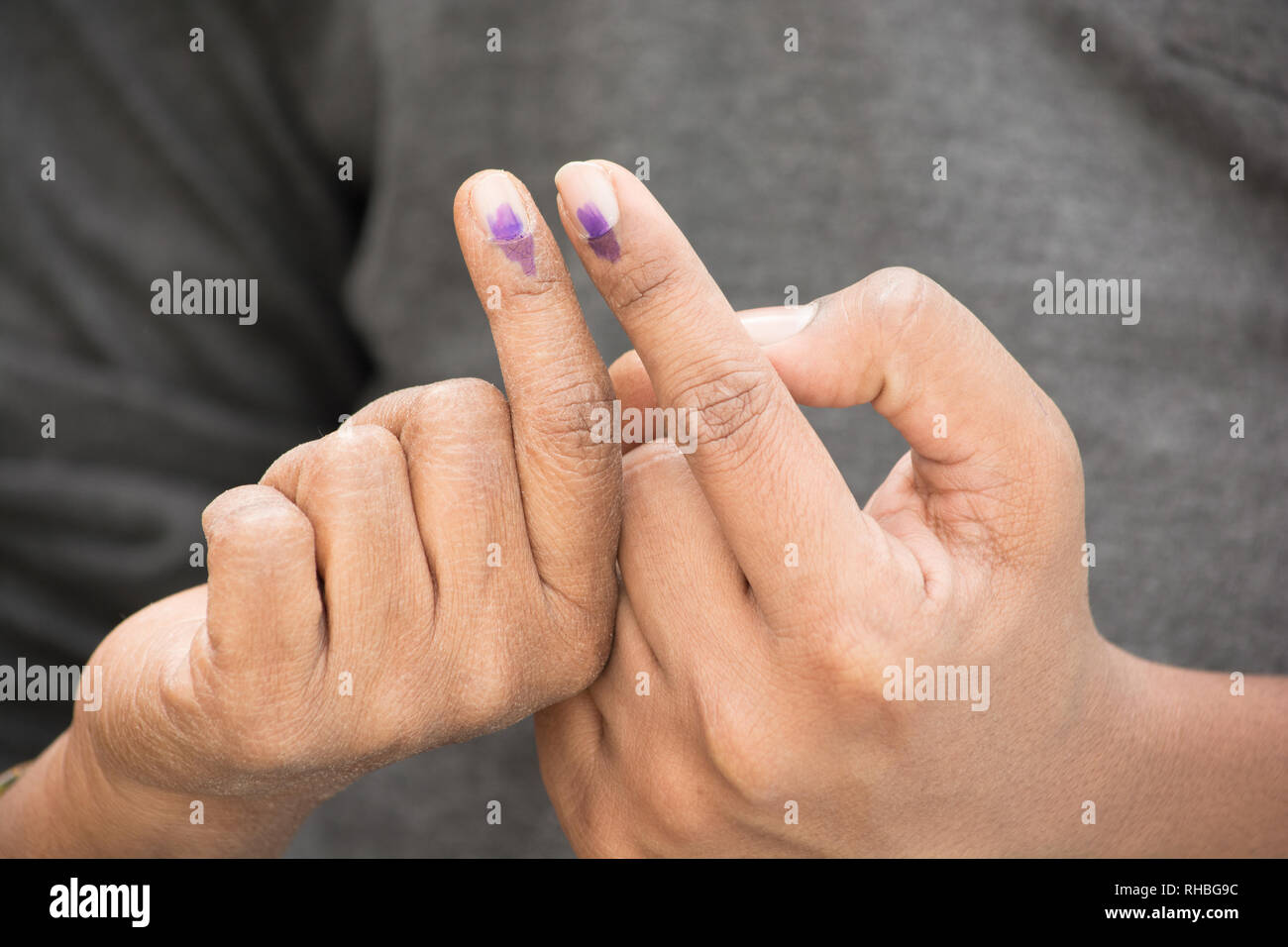 Indian Voter showing voting sign after the polling Stock Photo - Alamy