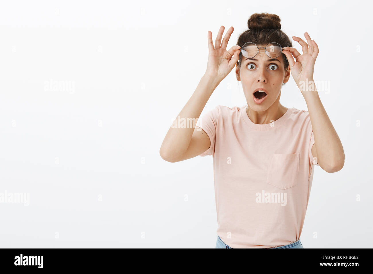 Portrait Of Confused And Shocked Woman Reacting To Bicycle Coming Out