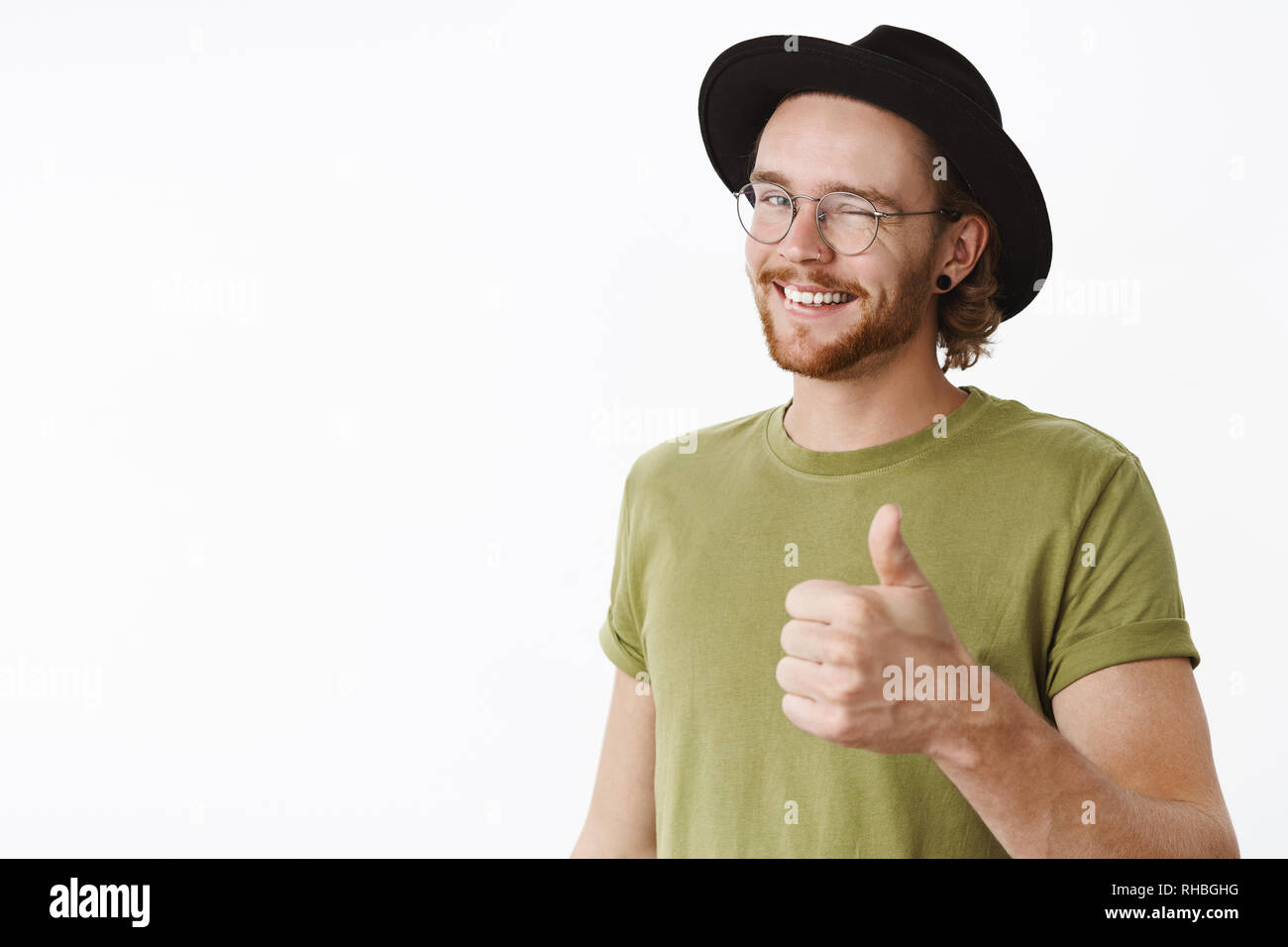 Thumbs up winking hi-res stock photography and images - Alamy