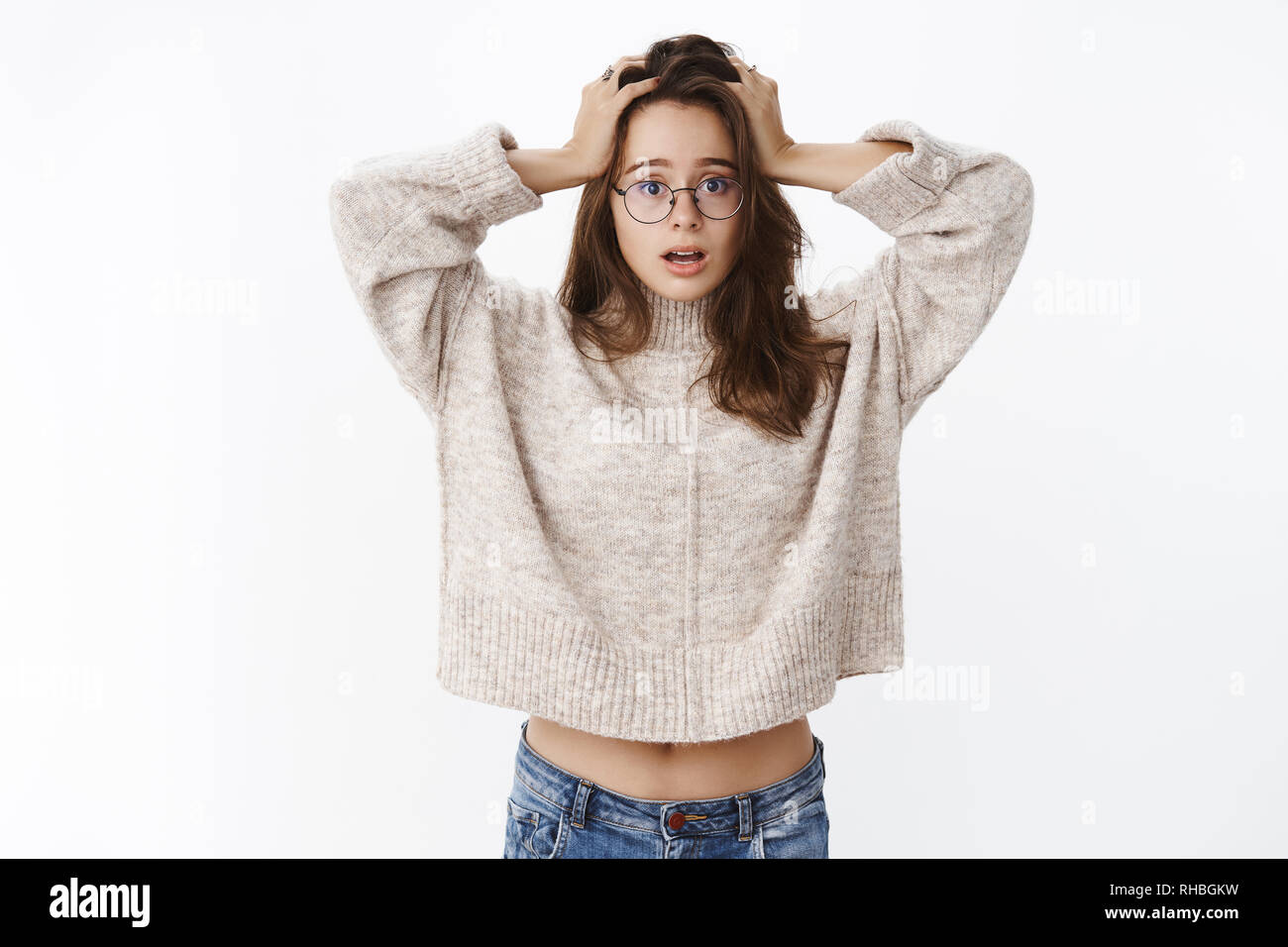 Oh my, what to do. Silly and clueless good-looking confused girl in ...