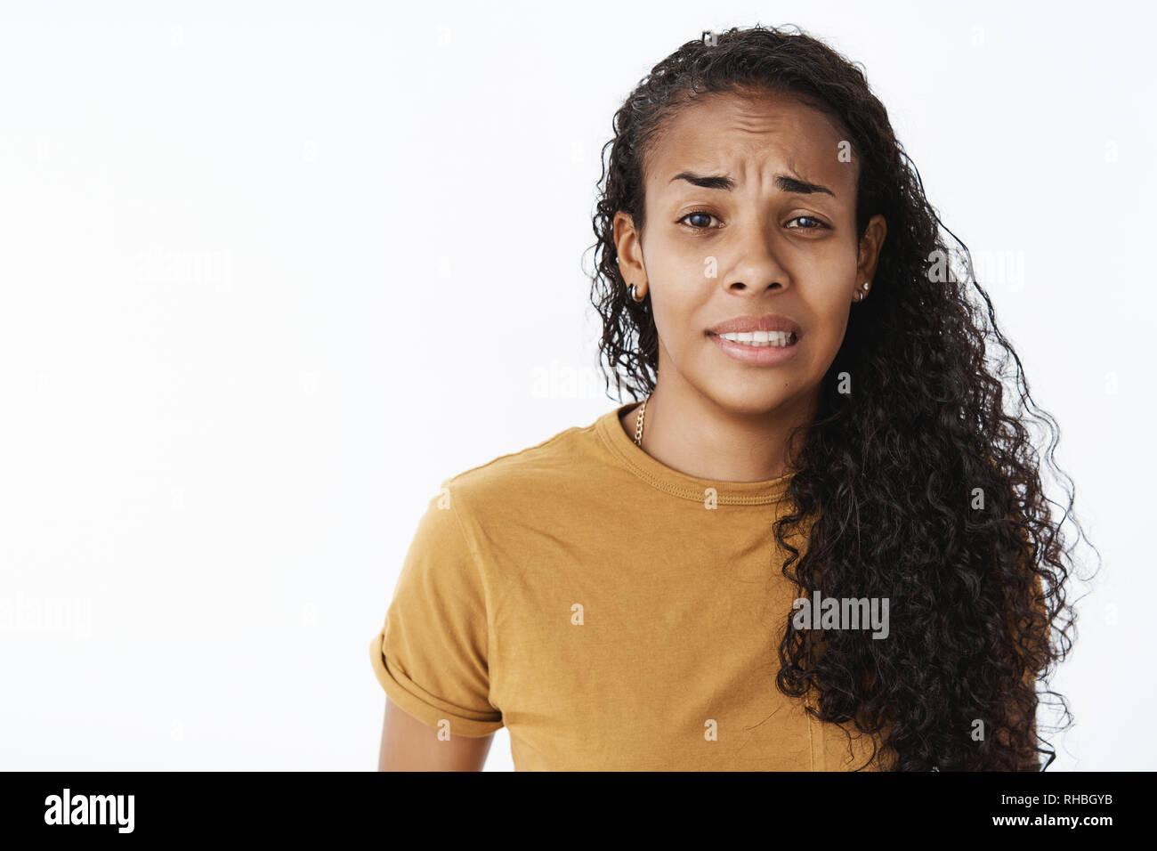 Yikes it bad. Portrait of worried awkward and displeased young clumsy ...