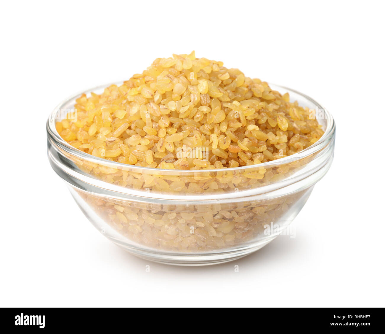 Dry bulgur wheat in glass bowl isolated on white Stock Photo - Alamy