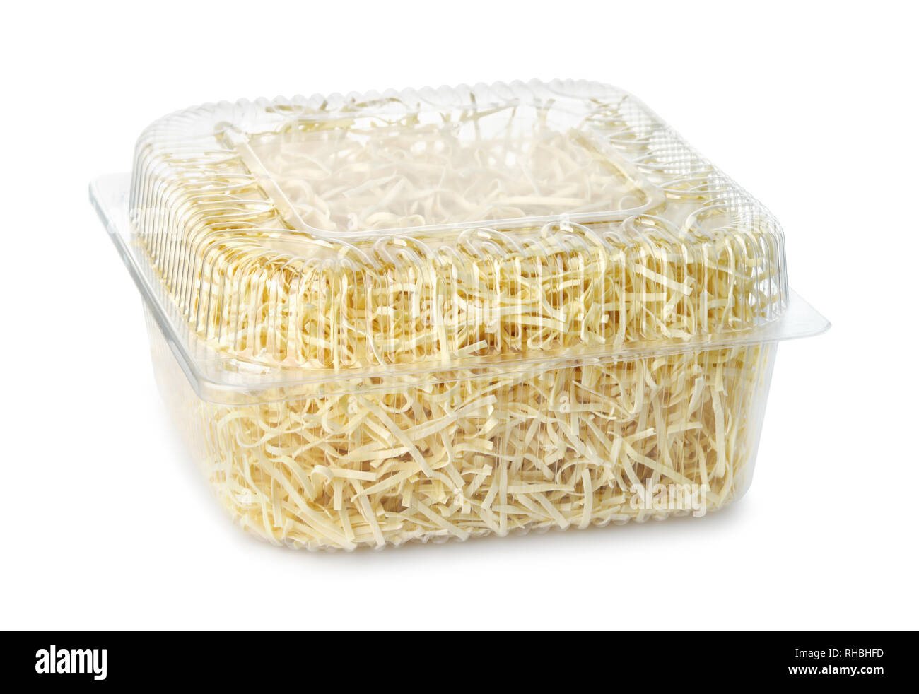 Dry egg noodles in clear plastic container isolated on white Stock ...