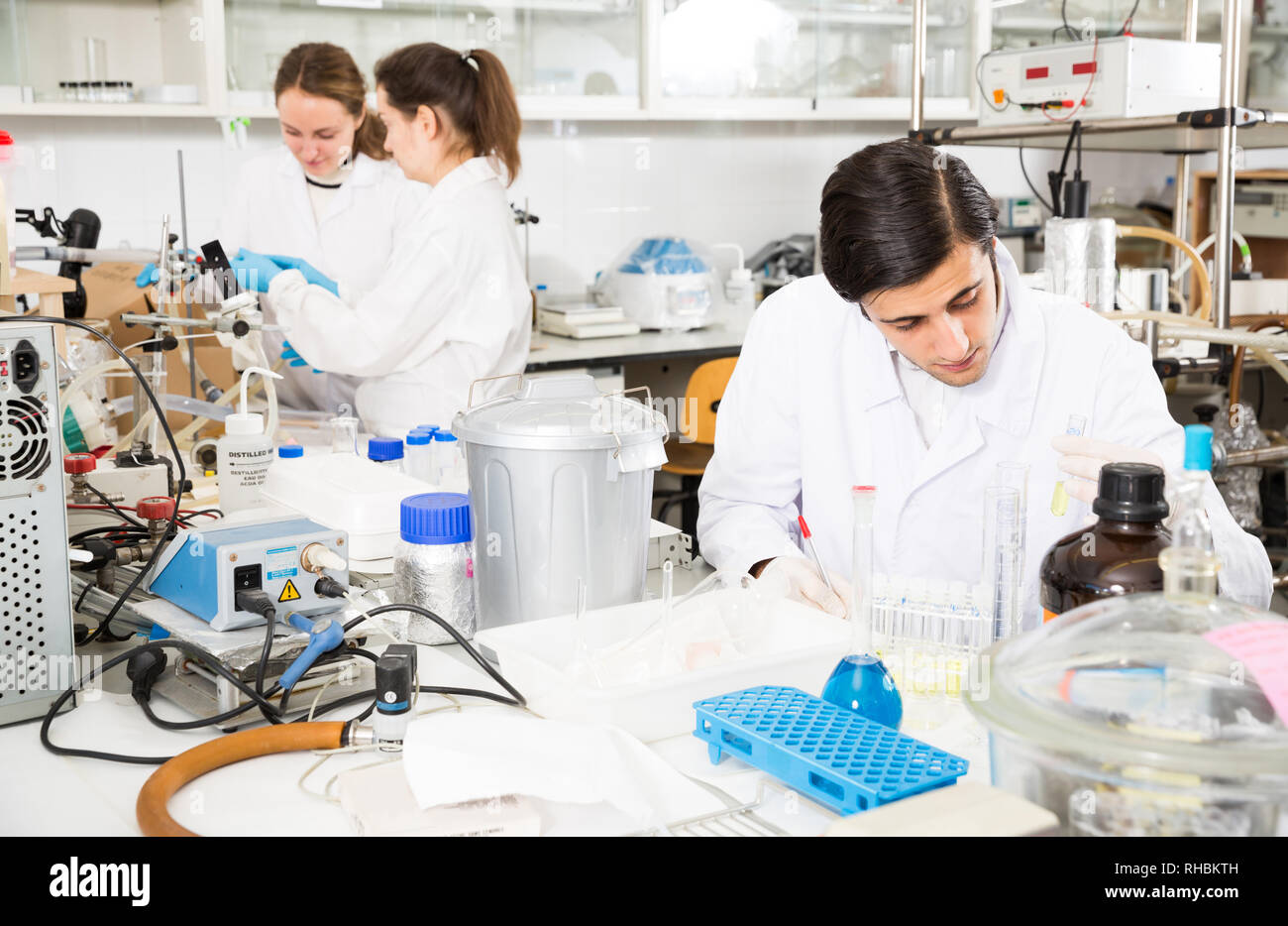 Student of Faculty of Biology performing experiments in university ...