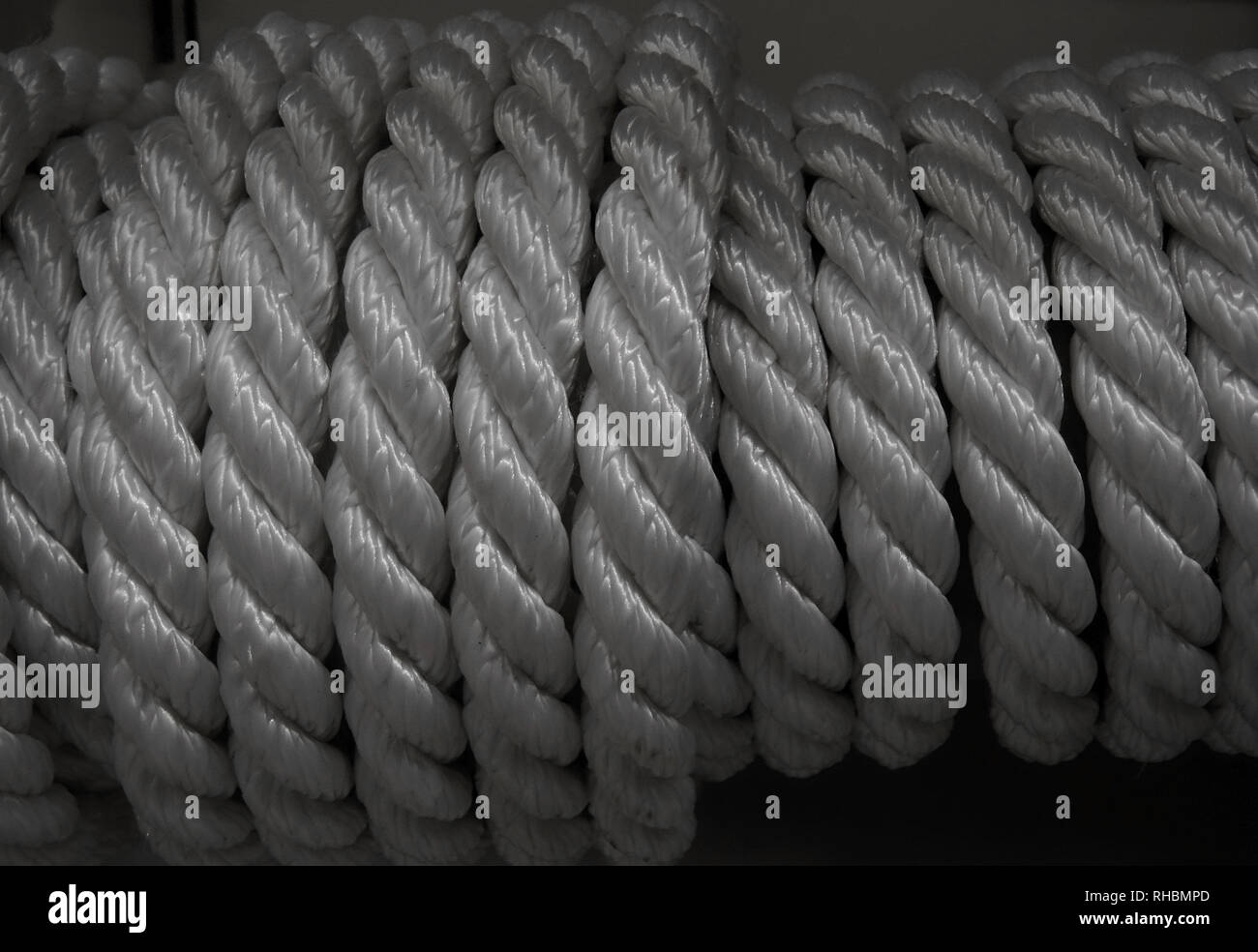 Bobbin of rough nylon twisted cord closeup texture background Stock ...