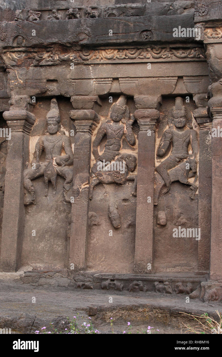 Outer wall of cave 16, facade detail with Karthikeya, Agni and Vayu ...
