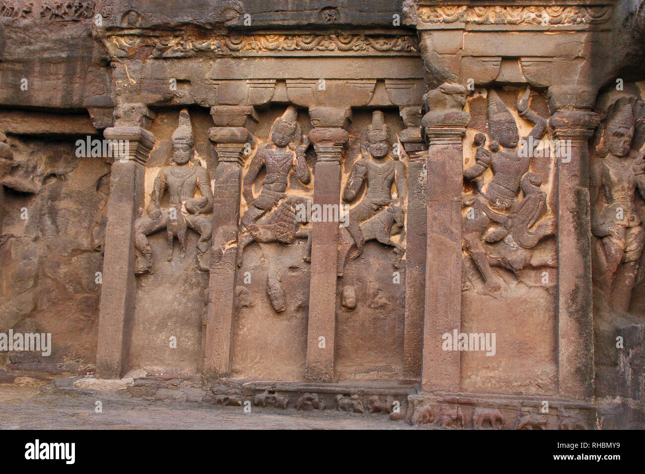 Outer wall of cave 16, facade detail with Karthikeya, Agni and Vayu ...