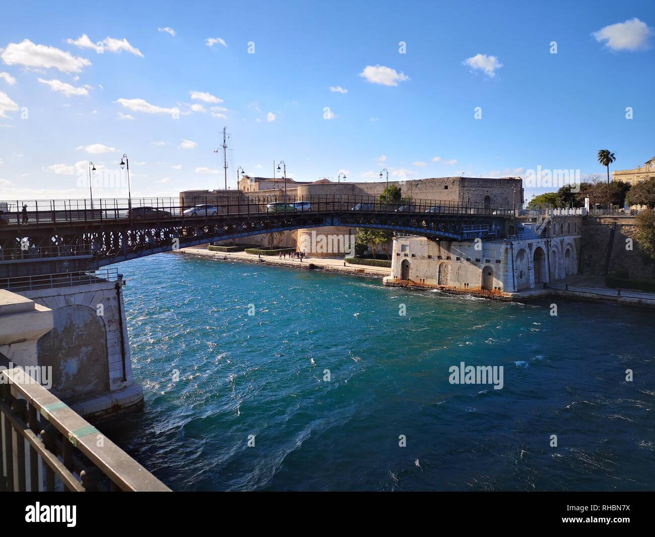 Sea view with Castello Aragonese and the swing bridge, also called ...