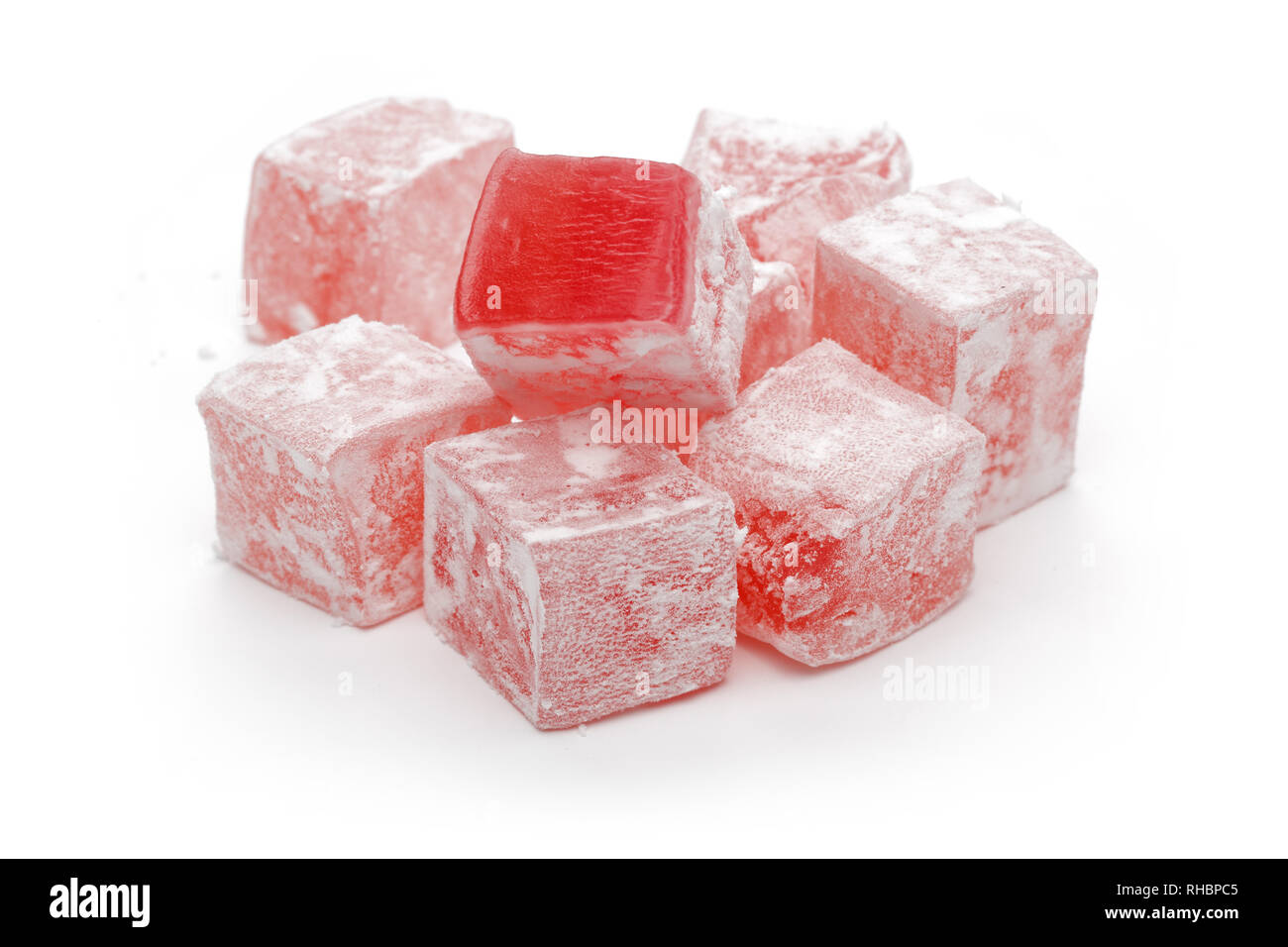 Red Turkish delight isolated on white background Stock Photo - Alamy