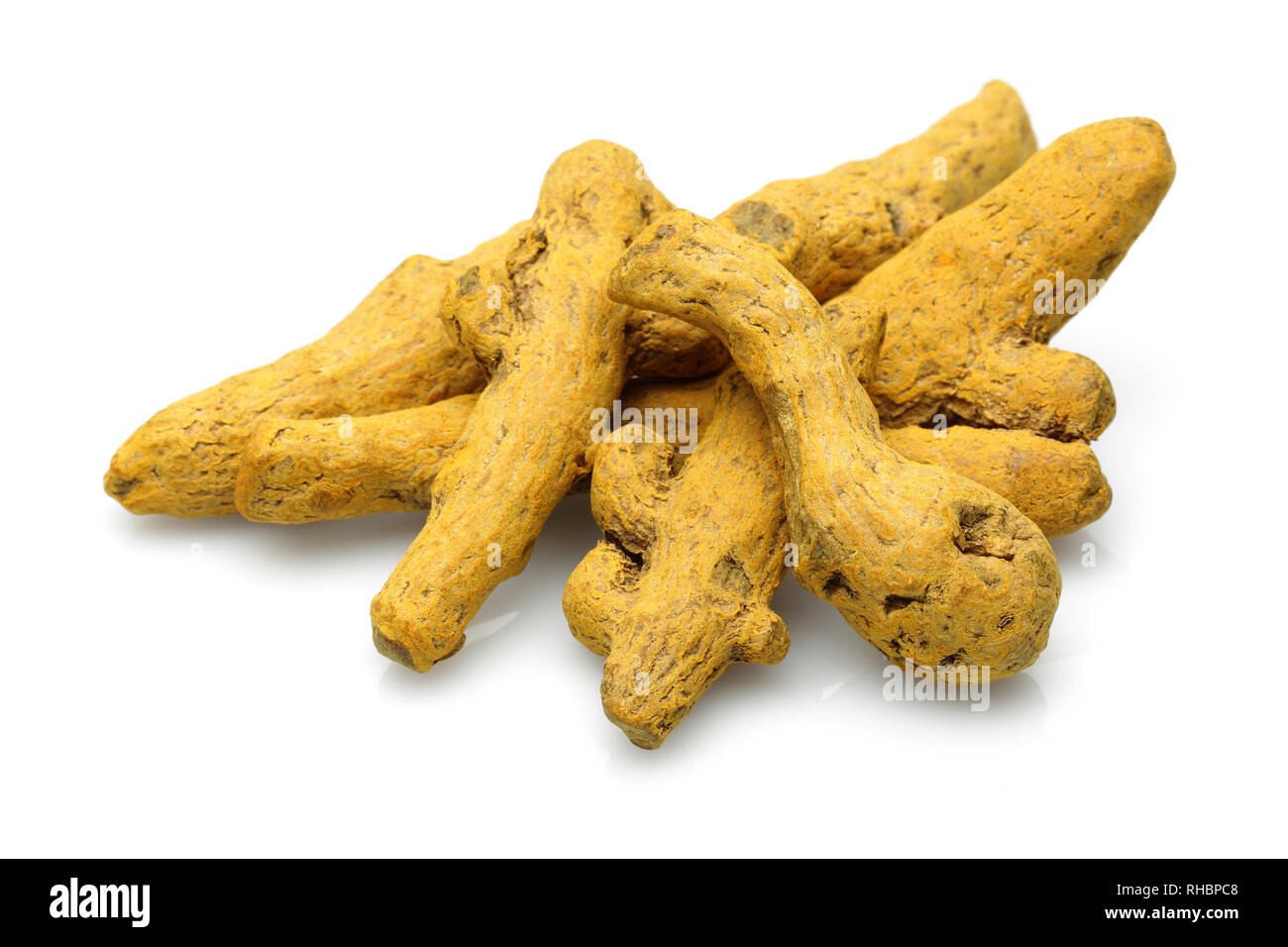 Dried turmeric isolated on white background Stock Photo - Alamy