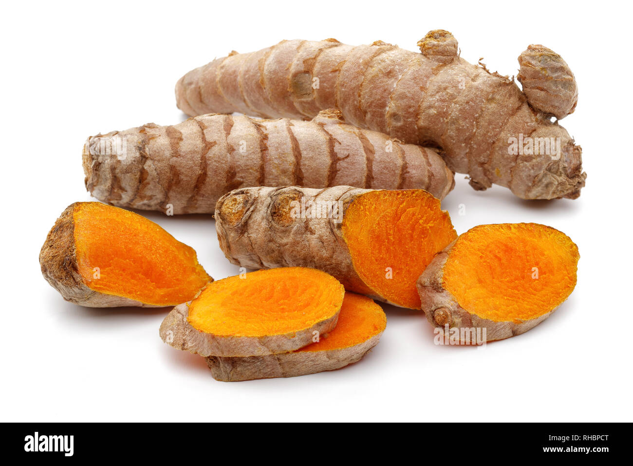 Fresh turmeric and slices isolated on white background Stock Photo - Alamy