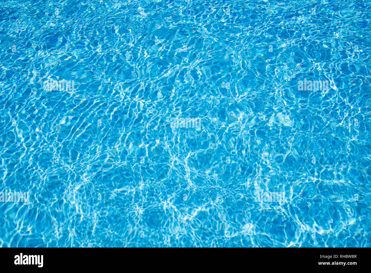 Blue water in a swimming pool Stock Photo - Alamy