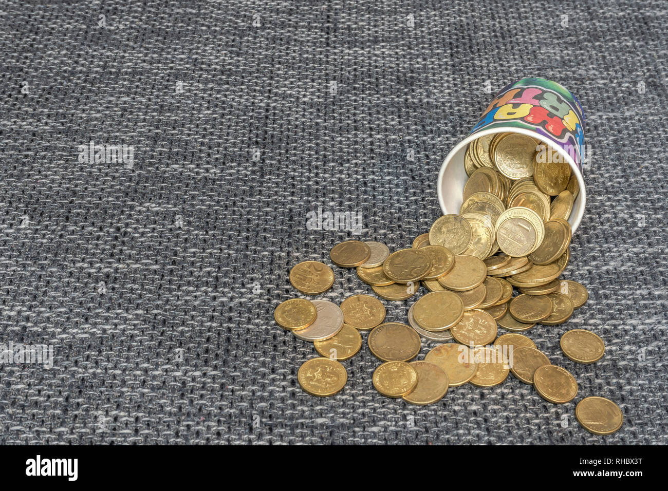 Spilled coins hi-res stock photography and images - Alamy