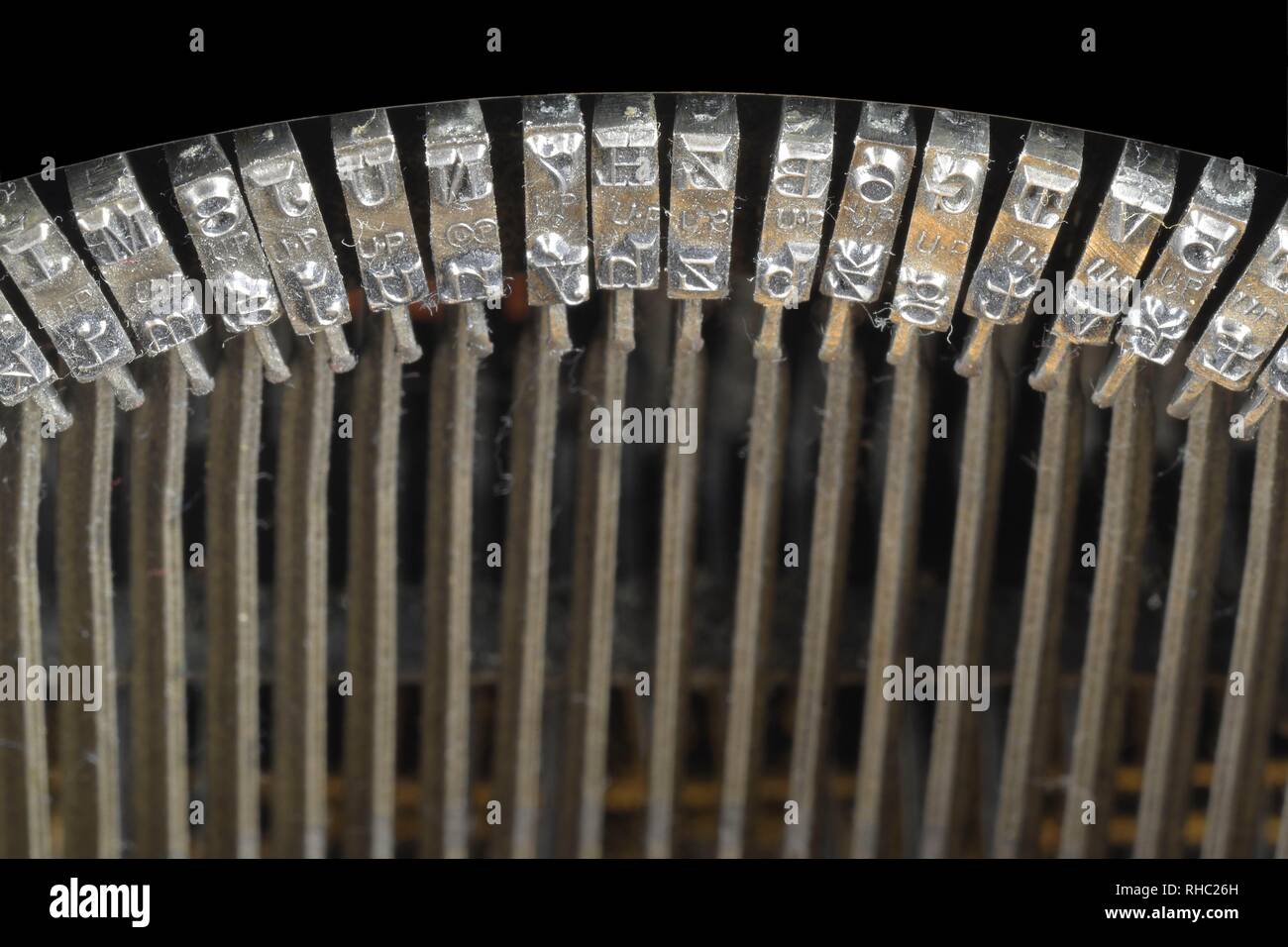 Traditional typewriter letterpress arms. Close-up of the striking ...