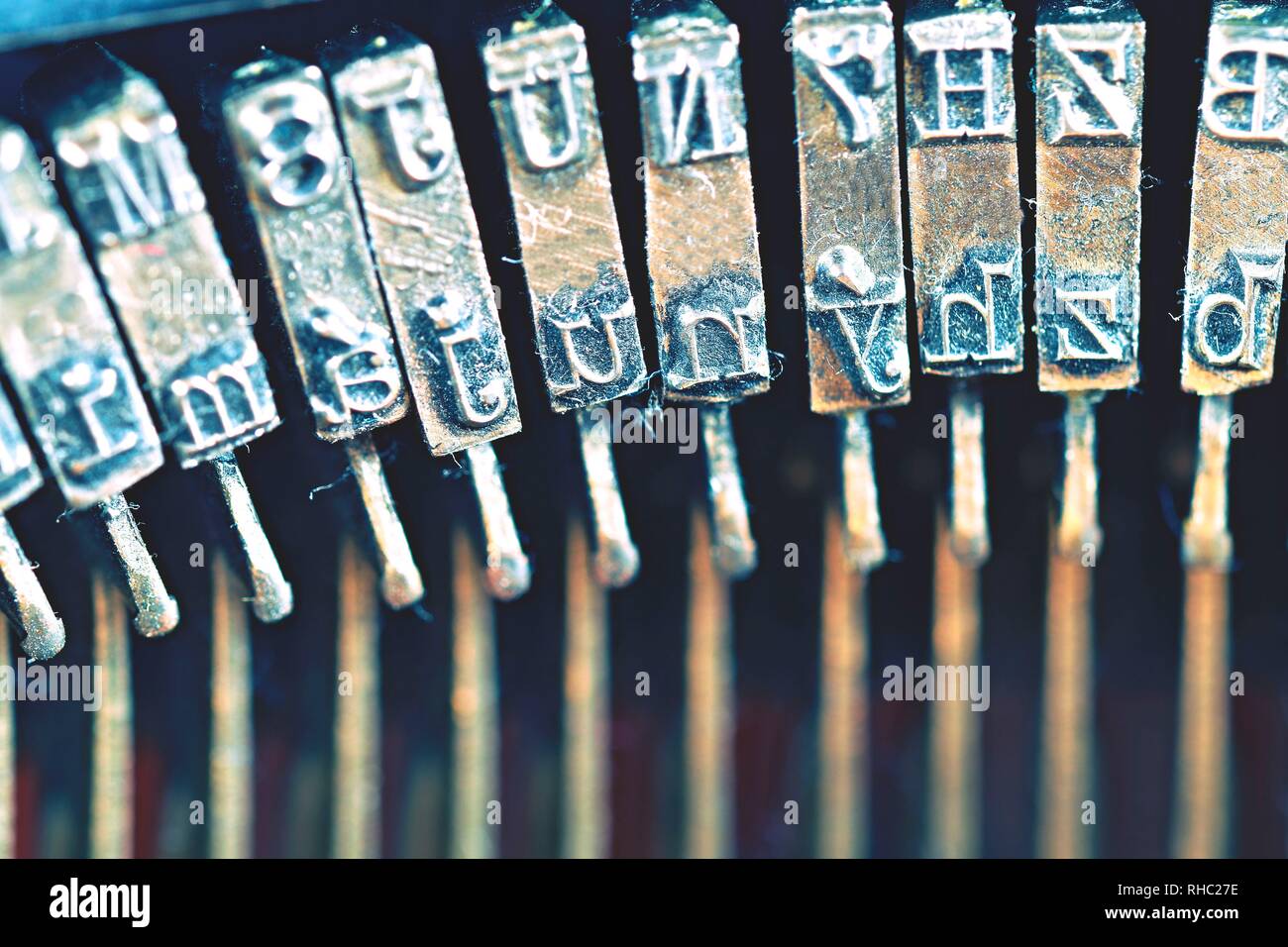 Close-up detail of typebars. Traditional typewriter letterpress arms ...