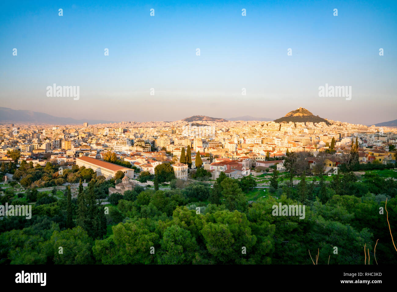 Panoramic view of Athens from the Acropolis at sunet with a blue and ...